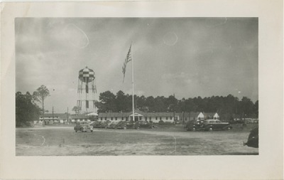 "Facilities at Keesler Field with a Checkered Water Tower"