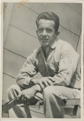 "United States Airforce Airman in Uniform, Seated in a Chair"