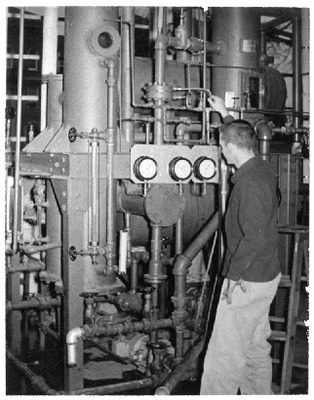 "William Irby Examines Double-Effect Evaporator"